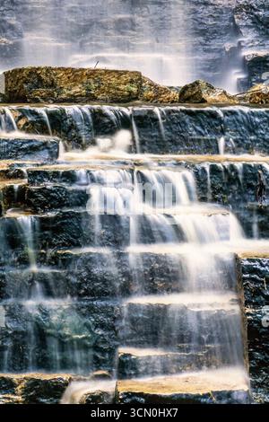 Water falling over rocks Stock Photo - Alamy
