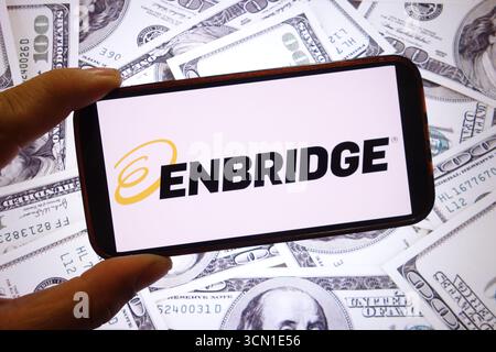 In this photo illustration, the Enbridge company logo is seen displayed ...