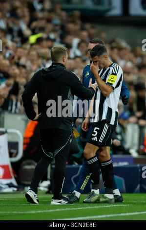 Fabian Schär Of Newcastle United goes down injured during the Newcastle ...