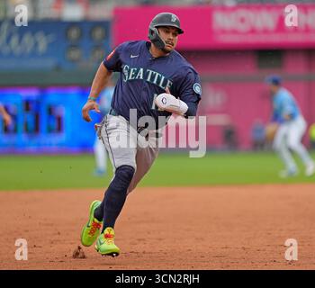Seattle Mariners' Josh Naylor (12) hits a pitch during the third inning ...
