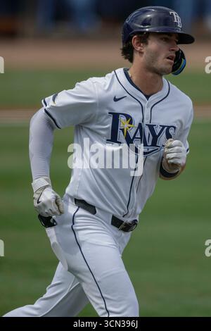 Tampa Bay Rays' Carson Williams, left, is tagged out at home plate by ...