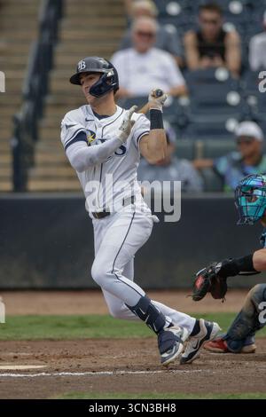 Toronto Blue Jays' Addison Barger hits a single against the Los Angeles ...