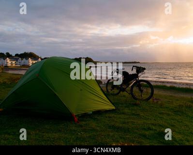 Wild camping at Ganavan beach, Oban, Argyll Stock Photo - Alamy