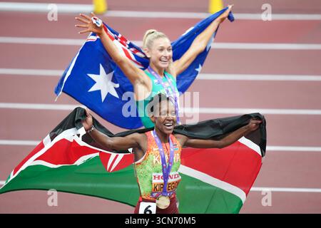 Jessica Hull and Faith Kipyegon celebrating her medal with her country ...