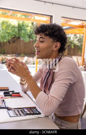Makeup brushes on a wooden table Stock Photo - Alamy