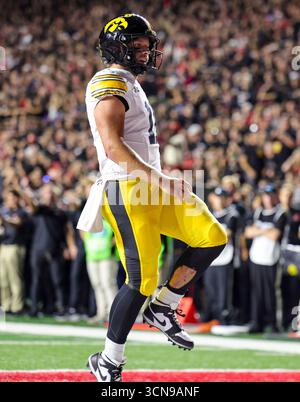 Iowa quarterback Mark Gronowski runs up field during the second half of ...