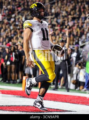 Iowa quarterback Mark Gronowski runs up field during the second half of ...