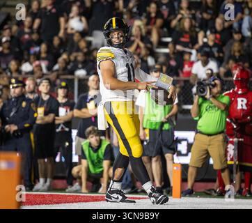 Iowa quarterback Mark Gronowski celebrates with teammate offensive ...