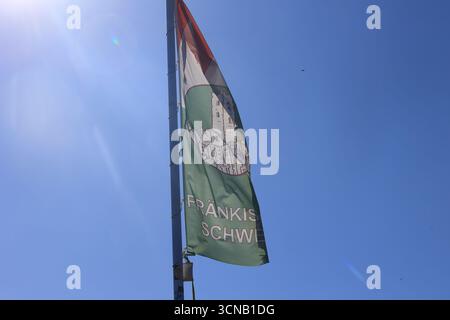 Waving Franconian flag in the blue sky, Nuremberg, Middle Franconia ...