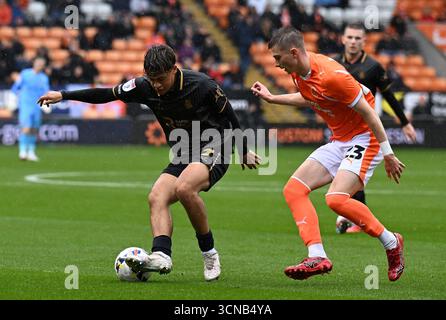 Barnsley's Caylan Vickers battles for the ball against Port Vale's ...