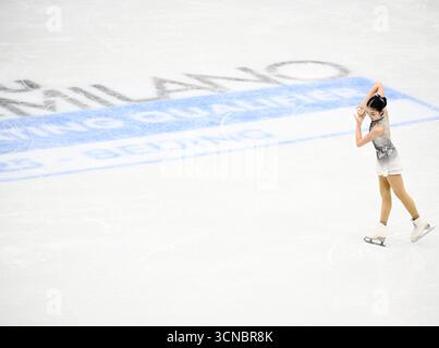 Zhang Ruiyang of China competes during the figure skating women's team ...