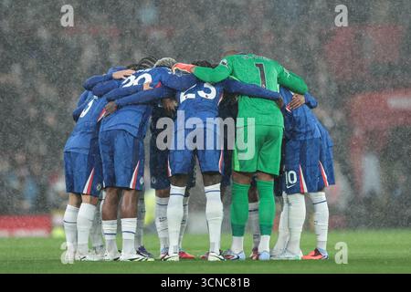 Manchester United group huddle during the Premier League match ...