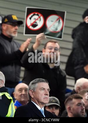 Rangers chairman Andrew Cavenagh (centre) in the stands before the ...