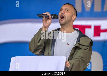 Green Party leader Zack Polanski (right) with his partner Richie Bryan ...