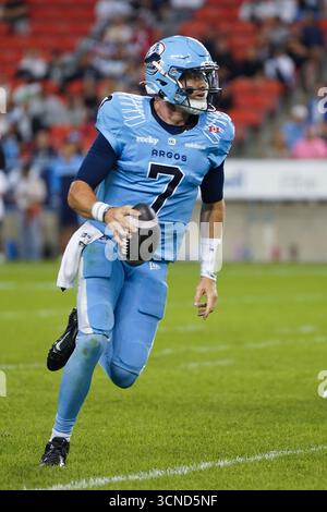 Toronto Argonauts' quarterback Jarret Doege is sacked by Hamilton Tiger ...