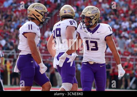 James Madison wide receiver Landon Ellis (13) fights off Louisiana ...