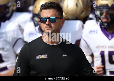 James Madison head coach Bob Chesney looks up at the stands during the ...