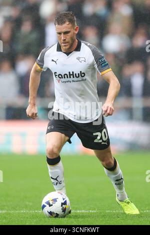 Derby County's Callum Elder and Preston North End's Brad Potts during ...