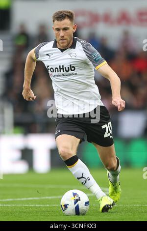 Derby County's Callum Elder and Preston North End's Brad Potts during ...