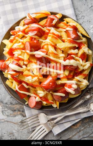 Homemade Peruvian Salchipapa Fries with Sausage Slices, Ketchup and ...