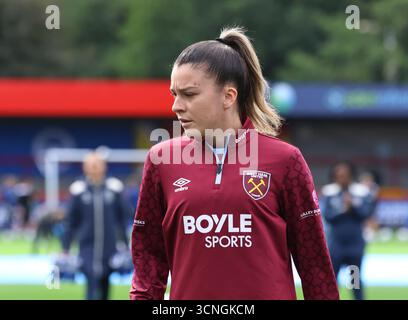 Anna Csiki (15 West Ham) heads away from Ava Rowbotham (8 Portsmouth FC ...