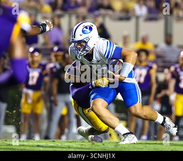 BYU quarterback Bear Bachmeier (47) passes the ball down field against ...