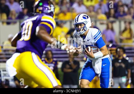 BYU quarterback Bear Bachmeier (47) leaps into the endzone during the ...