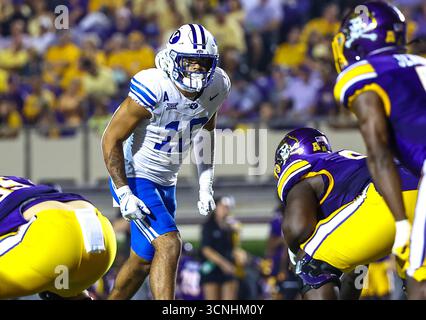 Brigham Young linebacker Isaiah Glasker, top, sacks Colorado ...
