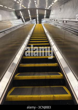 Follow the Yellow Brick Road. Escalator from the 100 feet deep subway ...