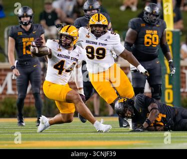 Arizona State linebacker Keyshaun Elliott (44) sacks West Virginia ...