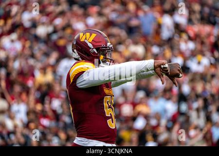 Washington Commanders defensive end Jacob Martin (55) takes his stance ...