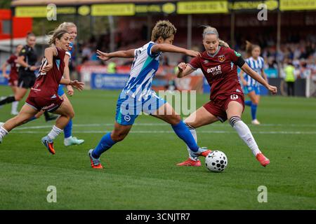 Anna Csiki (15 West Ham) heads away from Ava Rowbotham (8 Portsmouth FC ...