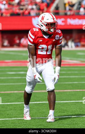 Nebraska running back Emmett Johnson (21) celebrates alongside Nebraska ...