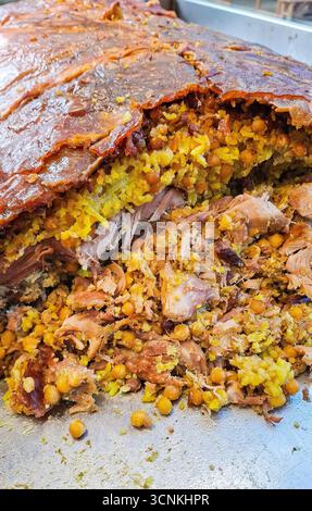 Suckling pig with rice, potato, arepa - Typical Colombian gastronomy ...