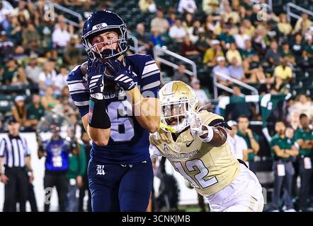 Rice wide receiver Drayden Dickmann, left, is hit in the back on the ...