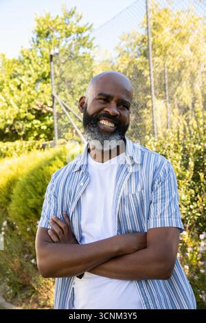 Middle-aged African American man holding large format paper whatman in ...