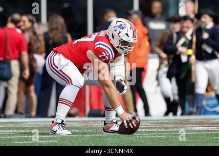 New England Patriots center Ben Brown (77) reacts after defeating the ...