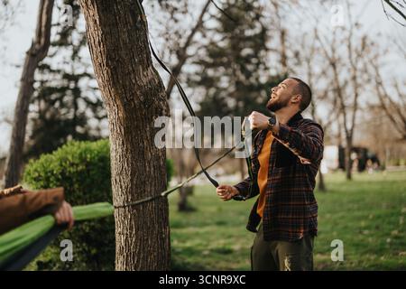 Enjoying a hammock among the trees, a concept idea reminiscent of the ...