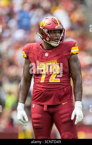 Washington Commanders offensive tackle Josh Conerly Jr. (72) lines up ...