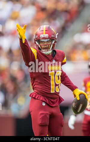 Washington Commanders wide receiver Chris Moore (19) runs a route ...