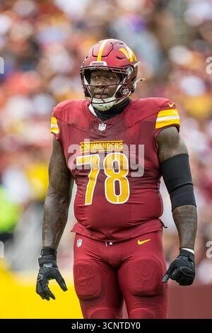 Washington Commanders offensive tackle Laremy Tunsil comes onto the ...