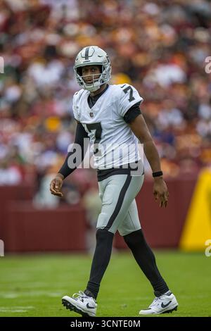 Las Vegas Raiders quarterback Geno Smith (7) runs with the ball against ...