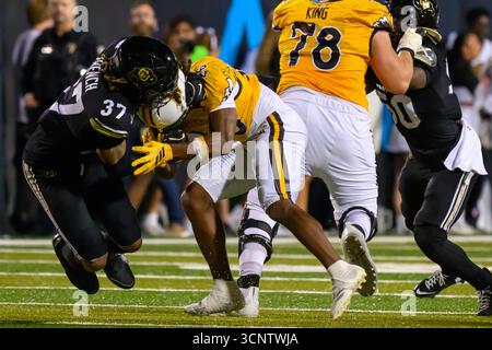 Wyoming running back Samuel Harris (26) runs the football during an ...