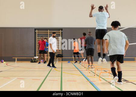 Young black sports coach running. Concept of sport Stock Photo - Alamy