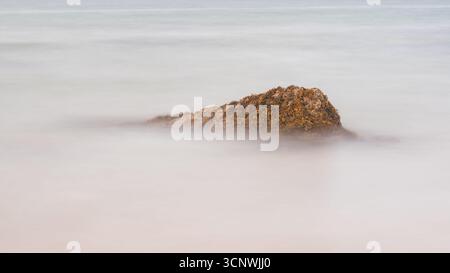 Rocks along the Moray Coast in Scotland, one of the apostles near ...