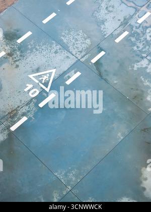 Worn tiled street surface. Abstract construction background Stock Photo ...