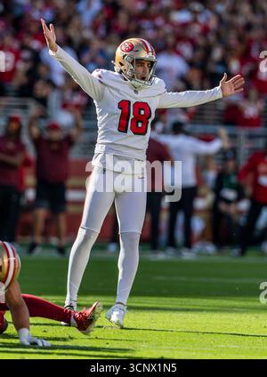 San Francisco 49ers kicker Eddy Piñeiro prepares for a kick as punter ...