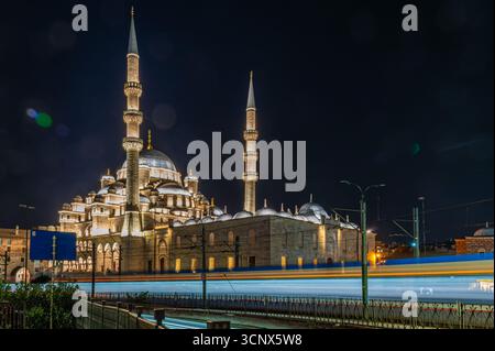 Turkiye. Istanbul. A night view of the Yeni Cami Mosque from the Galata ...