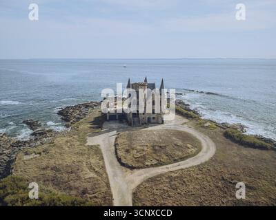 Aerial view of the Château Turpault standing proudly on the rugged ...