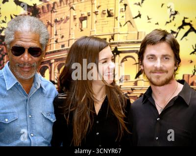 Katie Holmes and Morgan Freeman at a press conference for "Batman ...